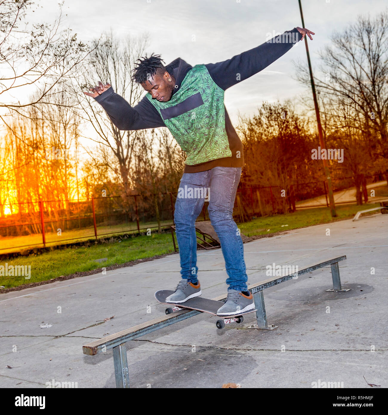 young skateboarder jumping on a ramp outdoor Stock Photo - Alamy