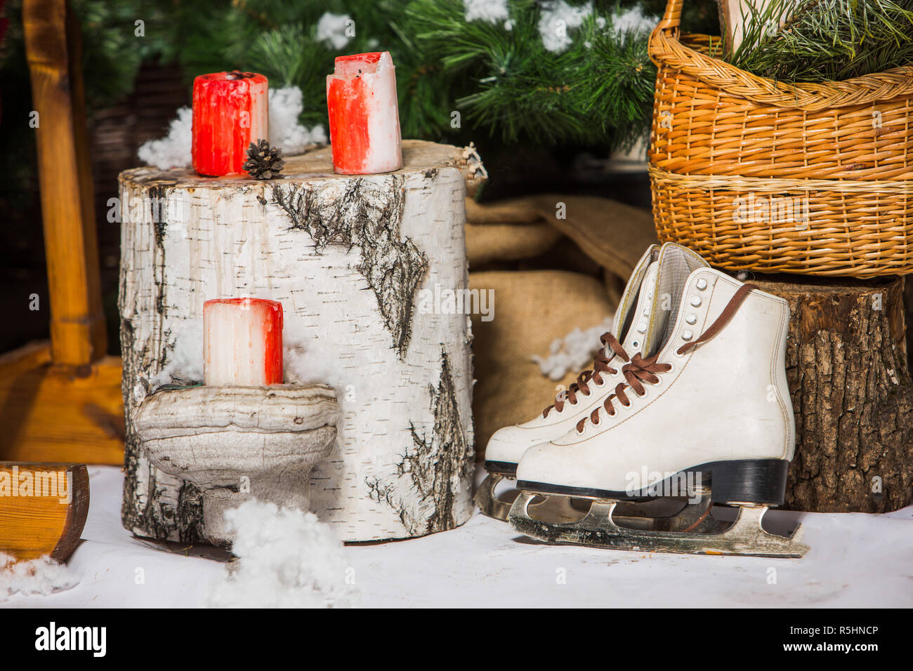 Vintage ice skates for figure skating with fir tree branch hanging on ...