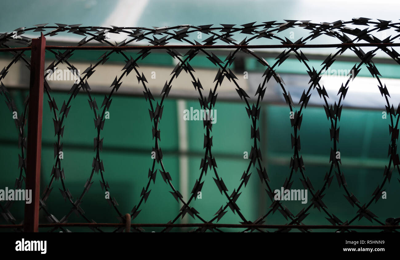 Razor wire metal mesh fence hi-res stock photography and images - Alamy