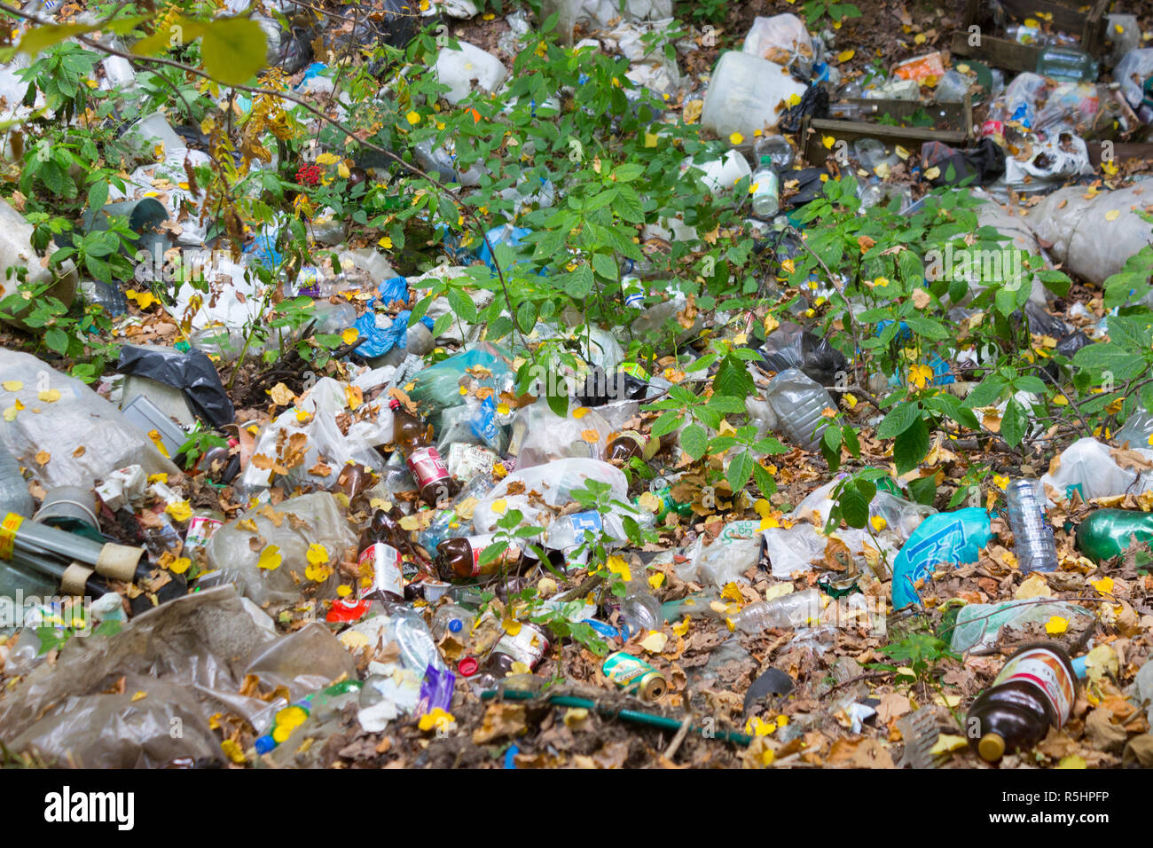 Plastic bag polluting green grass hi-res stock photography and images ...