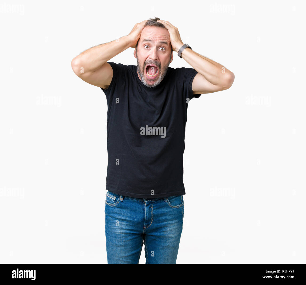 Old man looking shocked hands on head hi-res stock photography and ...