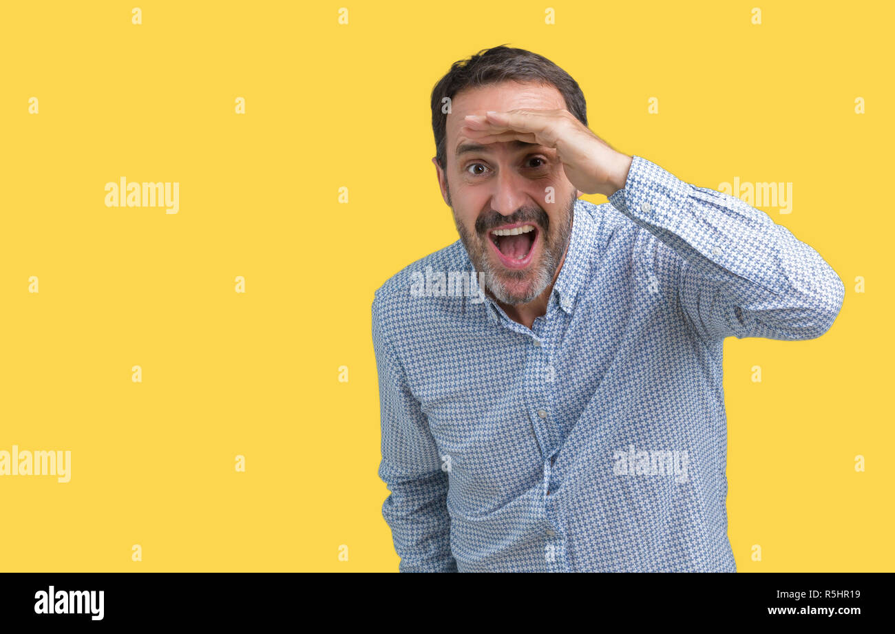 Handsome middle age elegant senior man over isolated background very ...