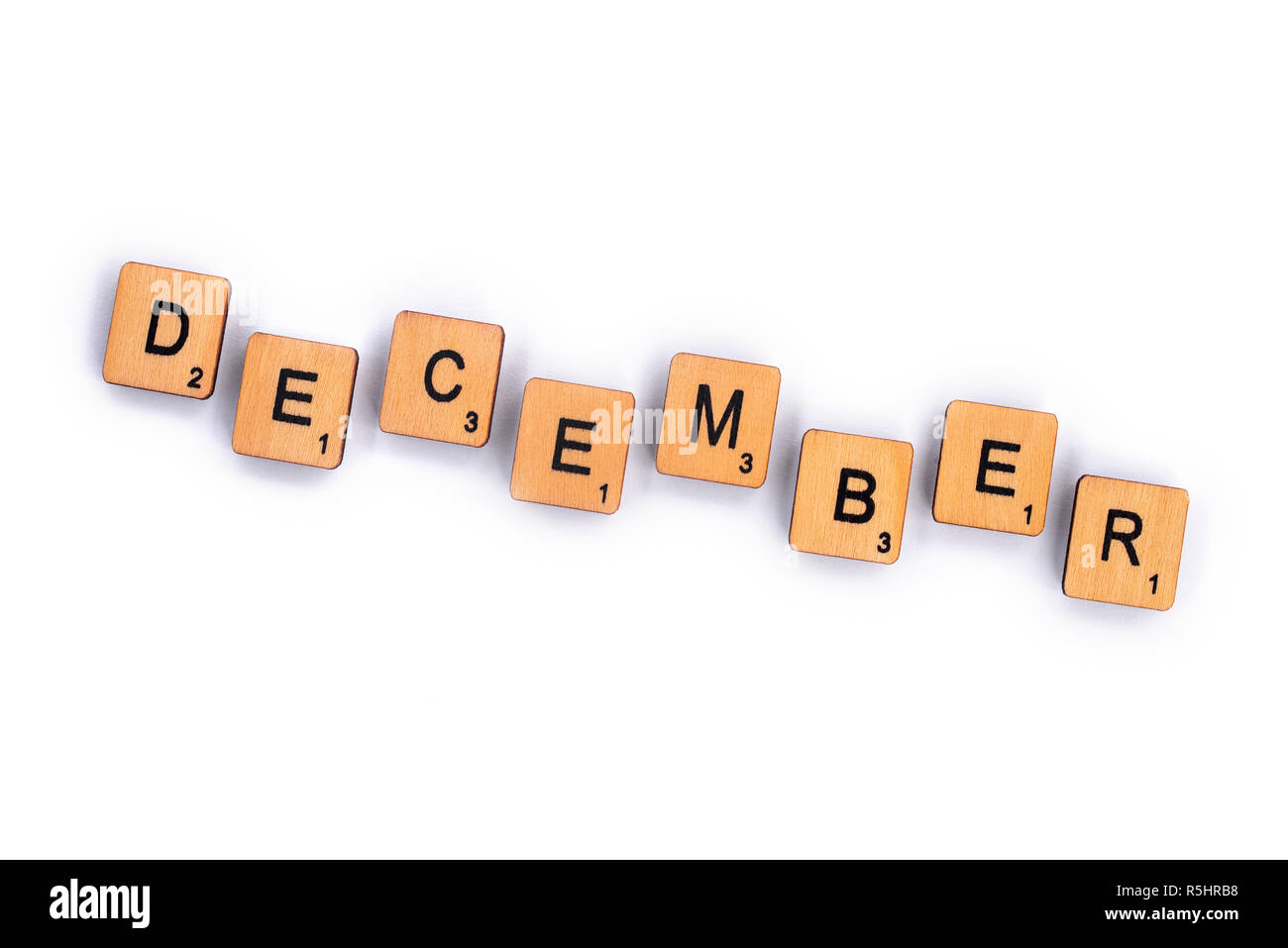 London, UK - July 8th 2018: DECEMBER, spelt with wooden letter tiles ...