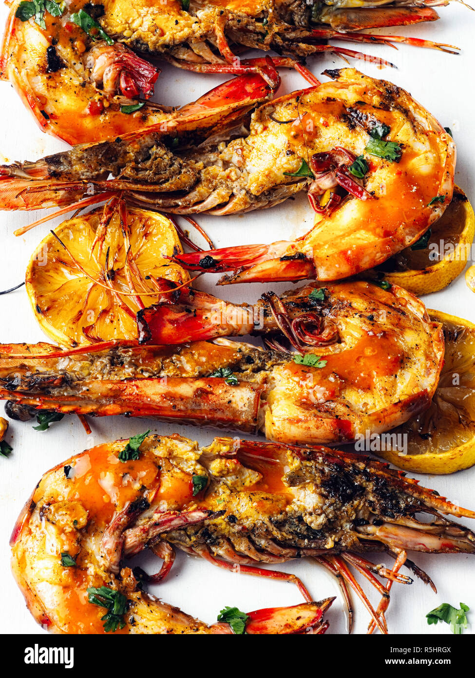 rustic piri-piri grilled prawn Stock Photo - Alamy