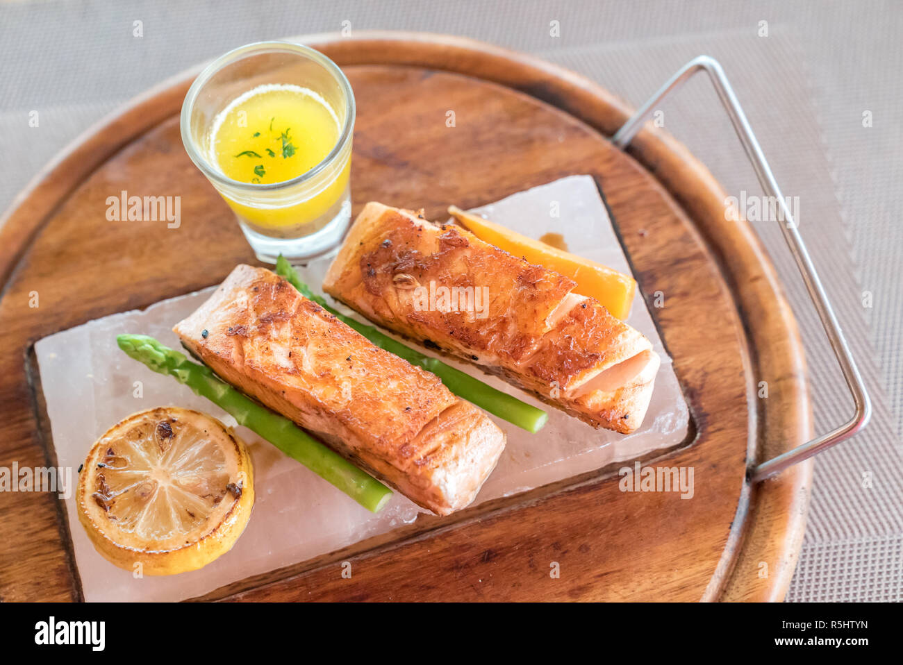 Grilled Atlantic Salmon with lemon sauce Stock Photo - Alamy