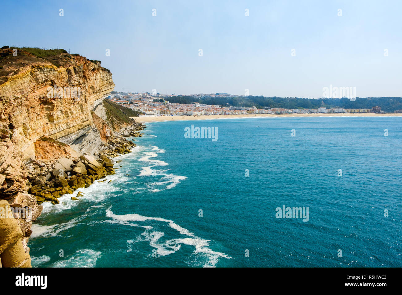 Nazare, Portugal - September 20, 2018 : On the cliffs of yellow stone ...