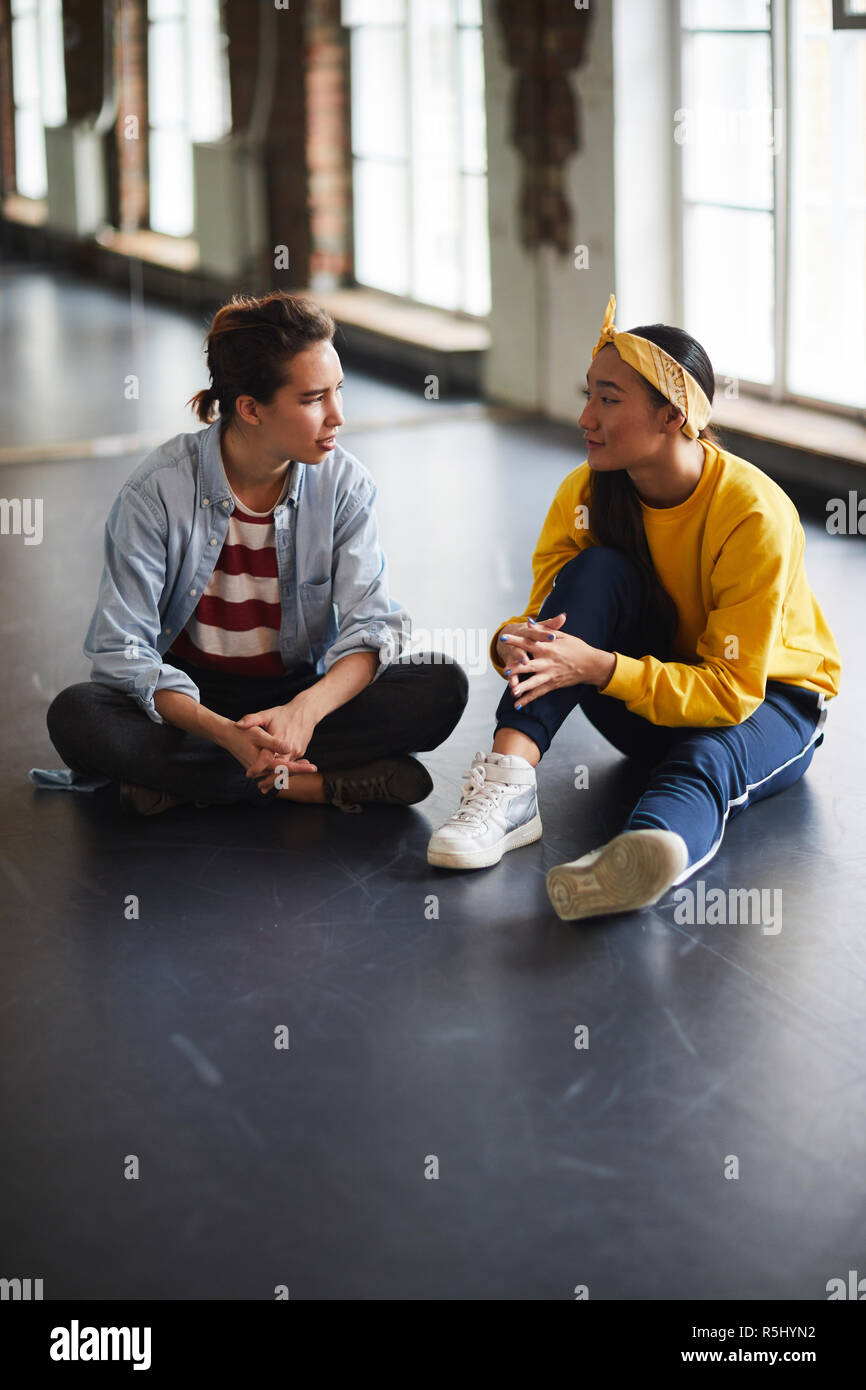 Conversation at break Stock Photo - Alamy