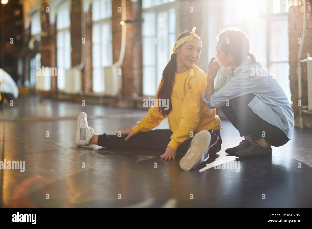 Discussing dancing troubles Stock Photo - Alamy