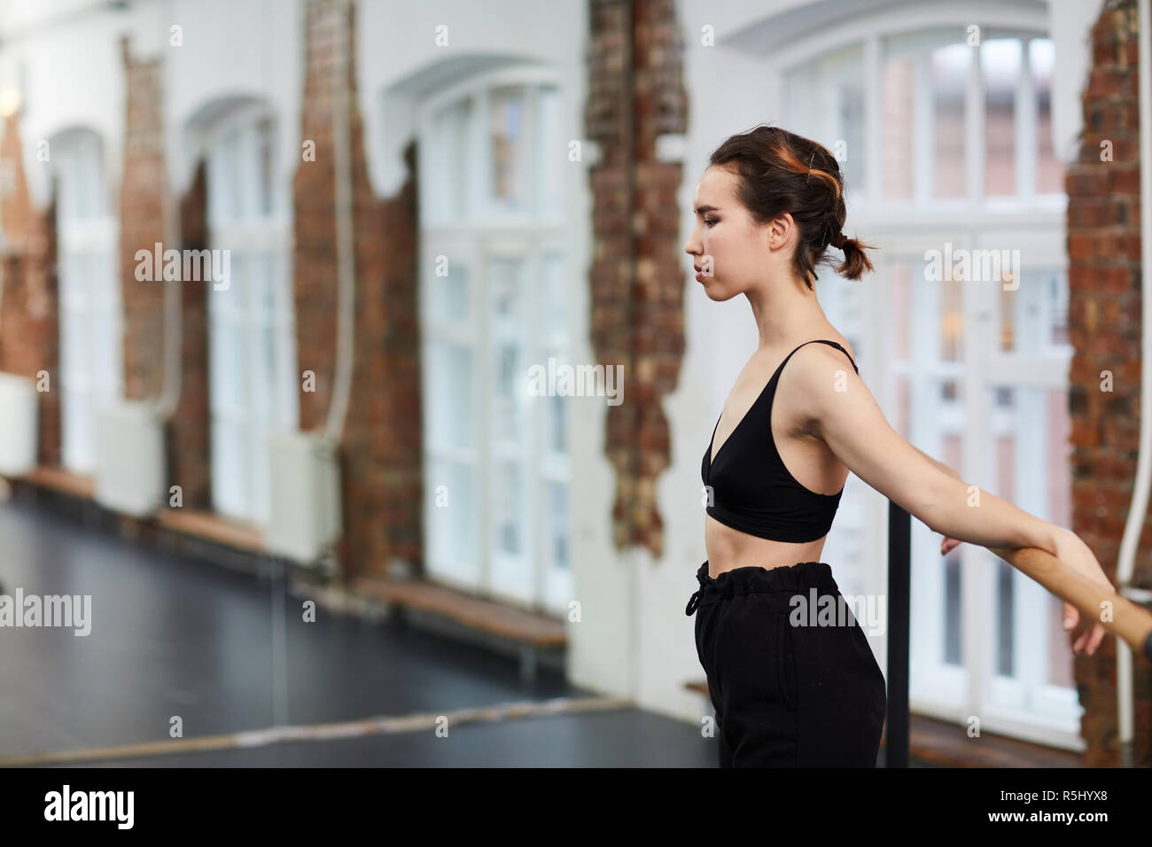 Girl training in studio Stock Photo - Alamy