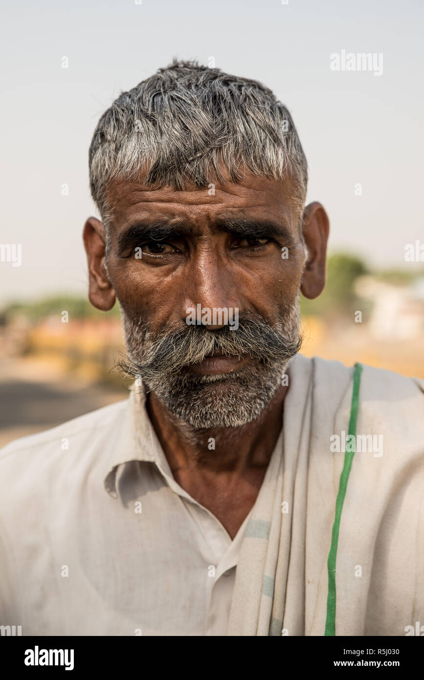 Portrait of an Indian man in a rural village, Kalakho, Rajasthan, India ...