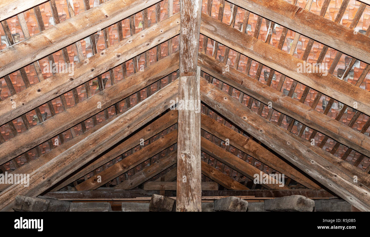 Vibrant colorful wooden interior of old, abandoned house. Wooden beams ...