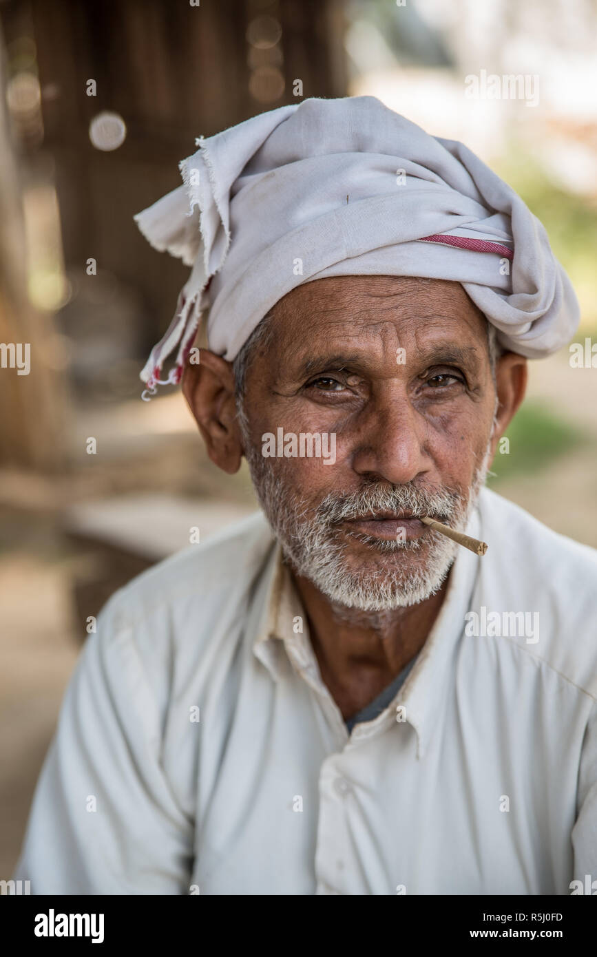 Portrait of an Indian man in a rural village, Kalakho, Rajasthan, India ...