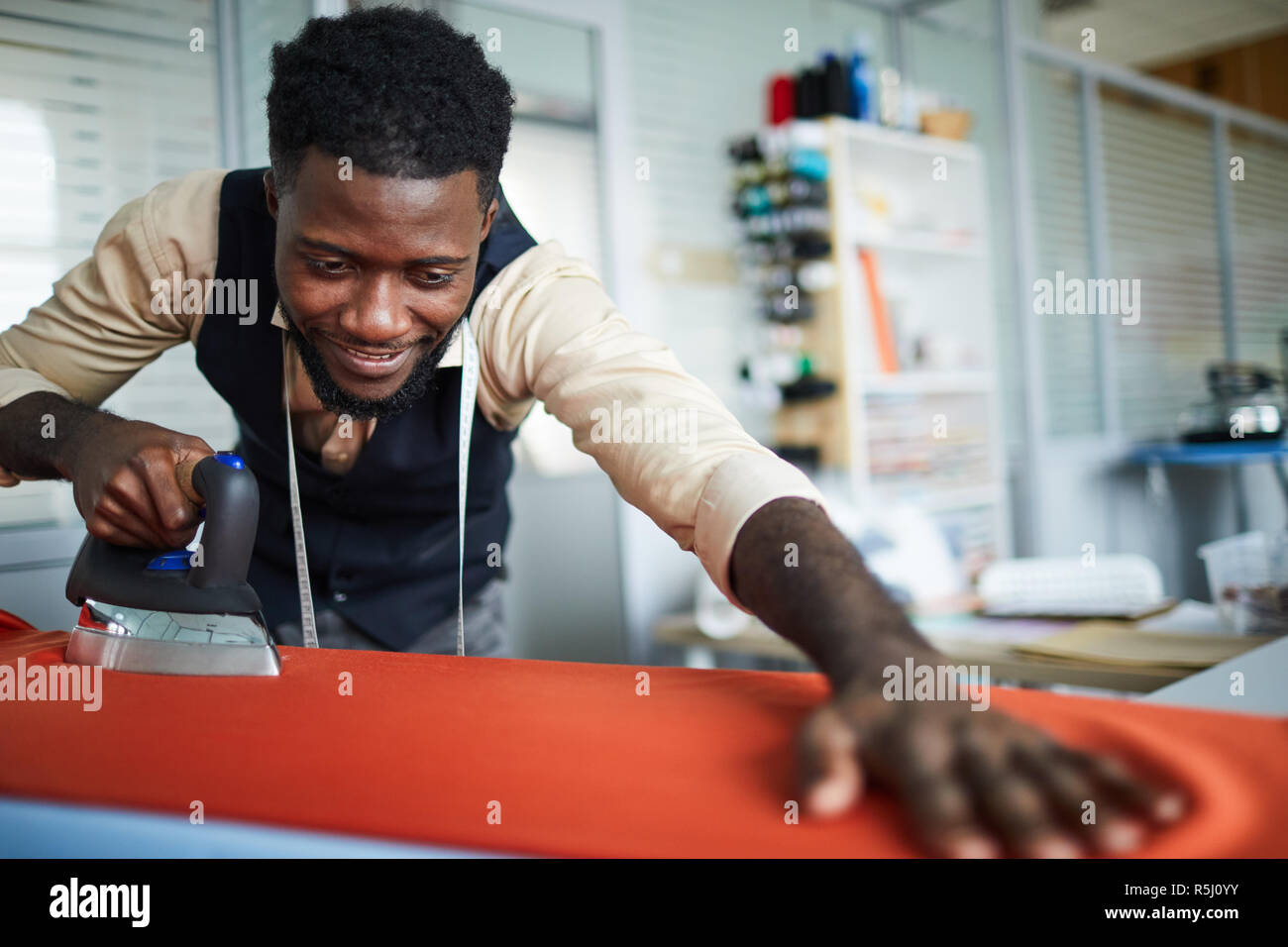 African american tailor preparing fabric hi-res stock photography and ...