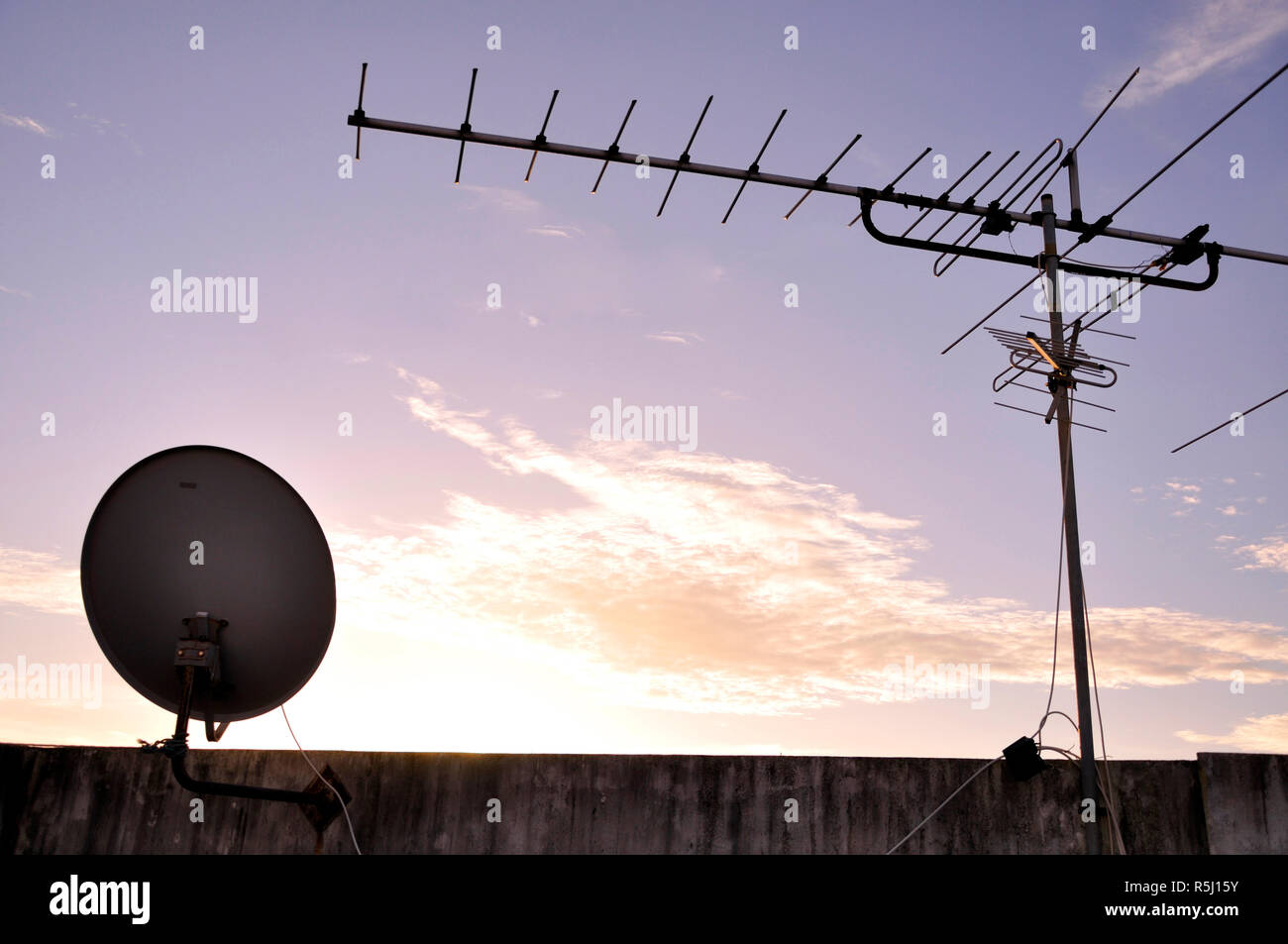 TV aerial and satellite dish Stock Photo - Alamy