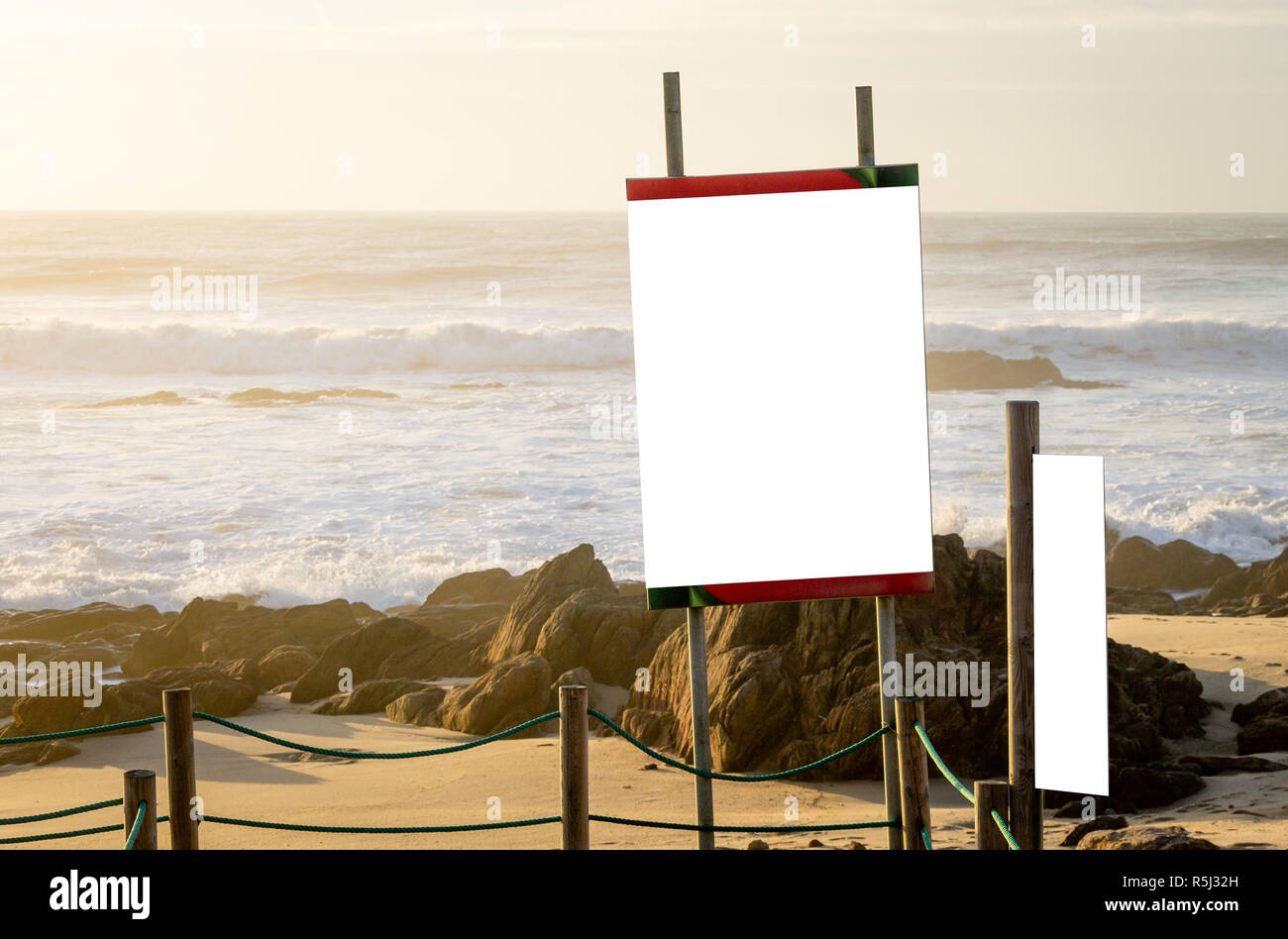 Two vertical warning or advertising poster mockups against seascape ...