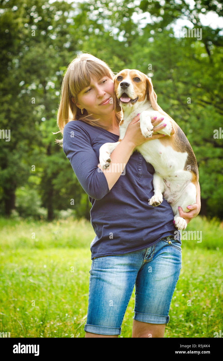 Woman with beagle dog hi-res stock photography and images - Alamy