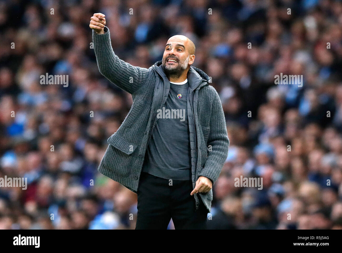 Manchester City manager Pep Guardiola gestures on the touchline during ...