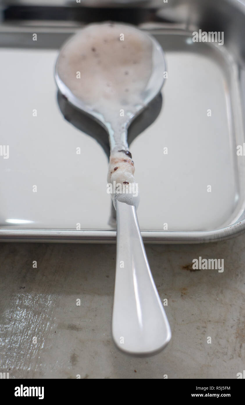 Shiny milk chocolate stain spoon Stock Photo - Alamy