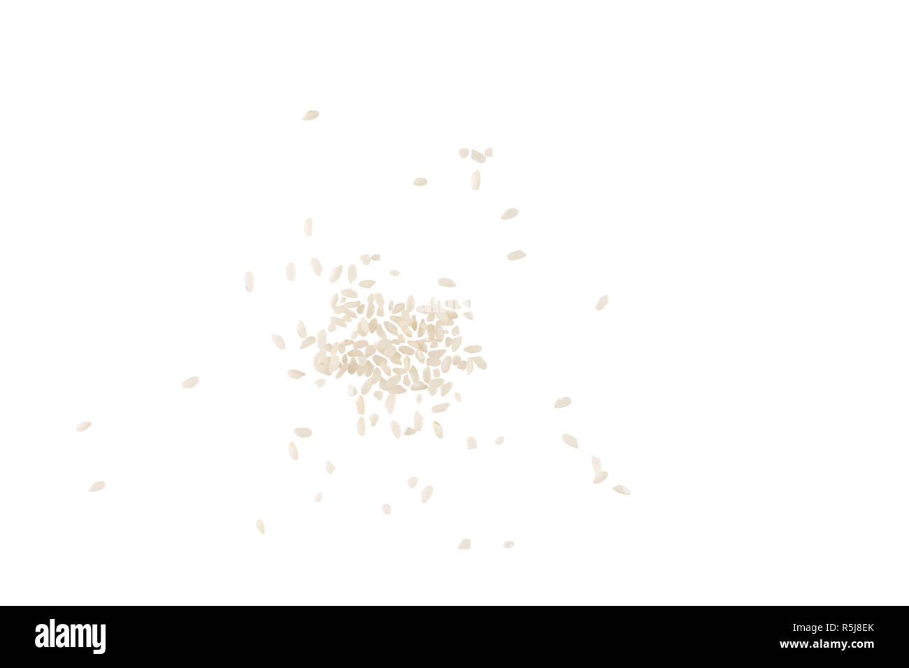 A scattering of white rice on a white background. Isolated Stock Photo ...
