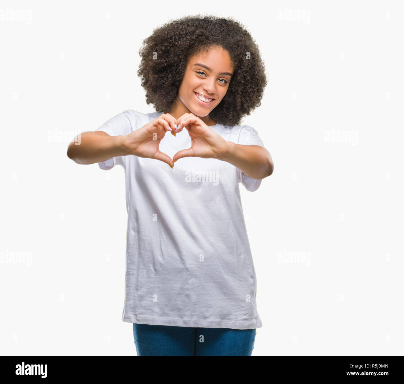 Young afro american woman over isolated background smiling in love ...