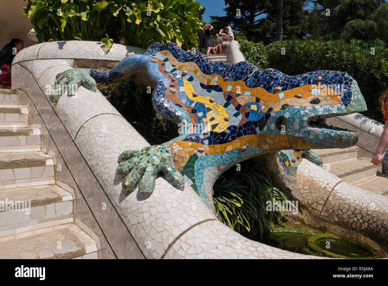 A decorative lizard made of colourful mosaic in the Park Guell designed ...
