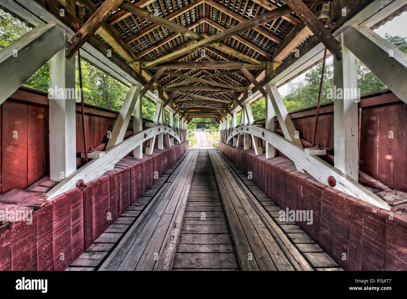 Built in 1881, the Glessner Covered Bridge crosses the Stonycreek River ...
