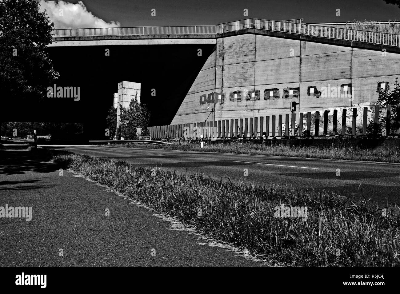 Concrete crash barrier wall Black and White Stock Photos & Images - Alamy