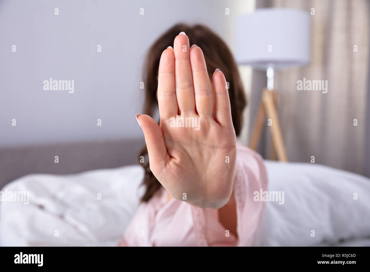 Close-up Of A Woman's Hand Making Stop Sign Stock Photo - Alamy