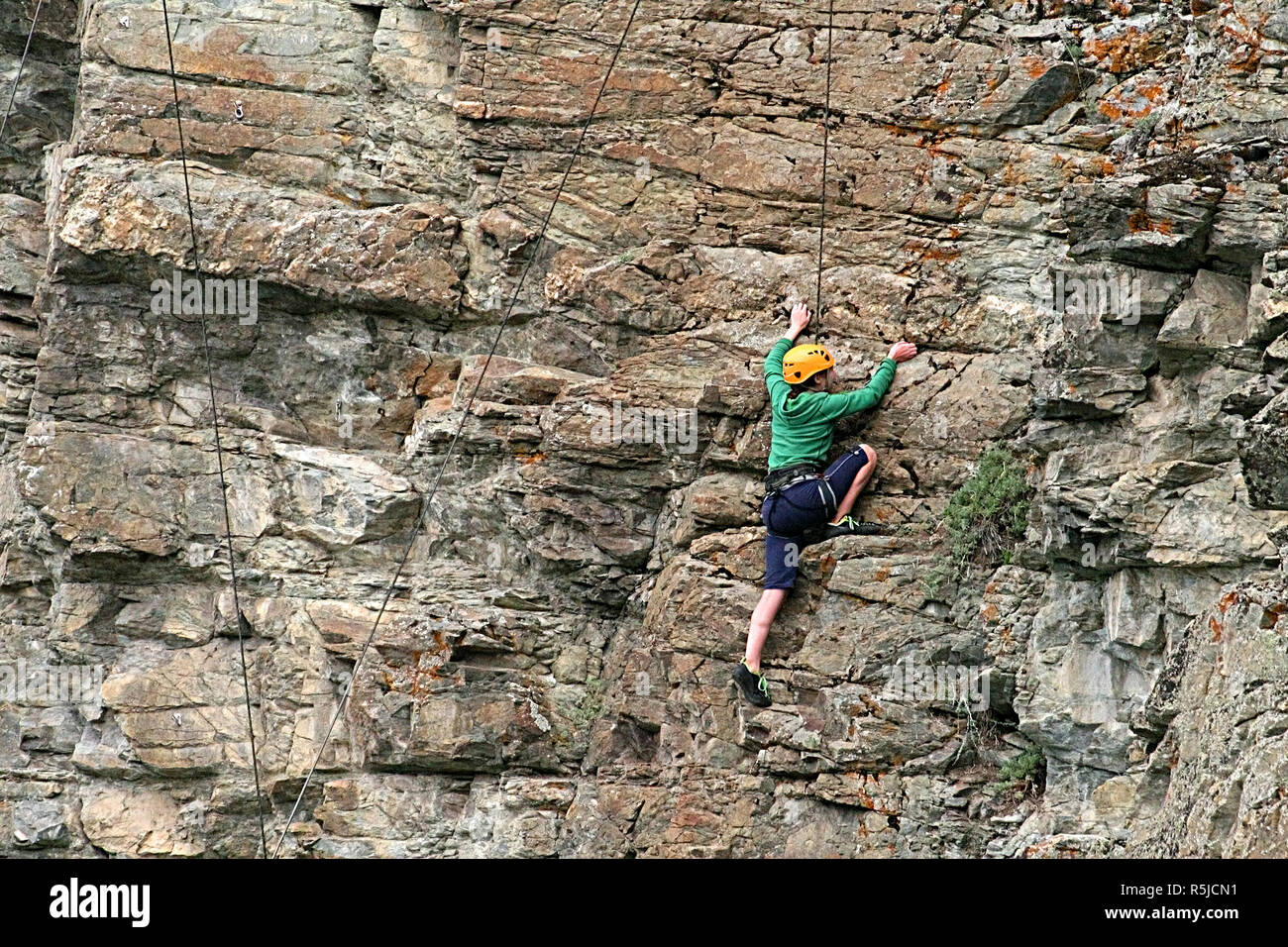 Rock repelling in the Yukon, Canada Stock Photo - Alamy