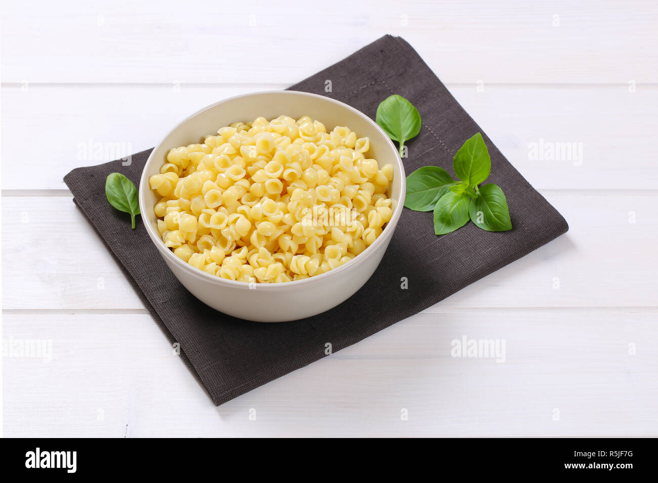 small pasta shells Stock Photo - Alamy