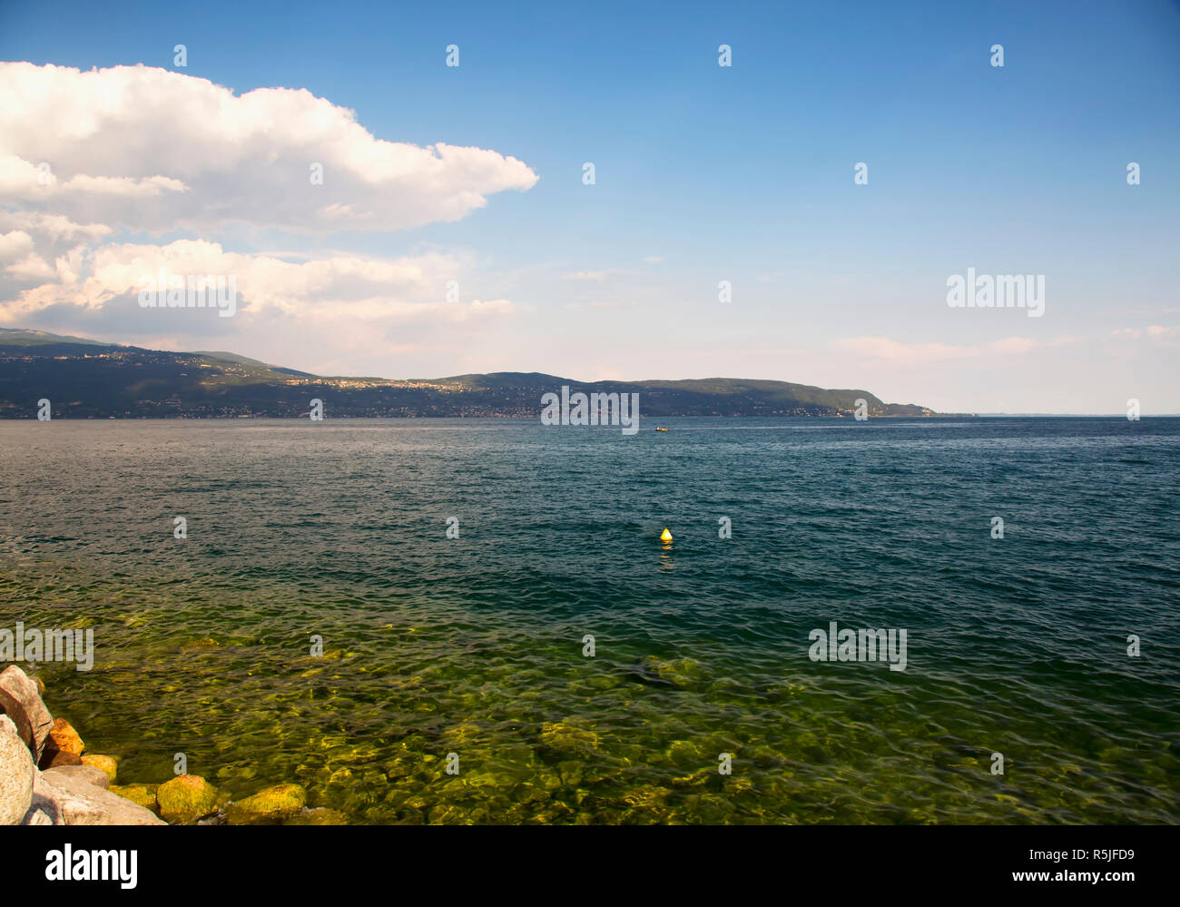 Lake view with blue and green water Stock Photo - Alamy
