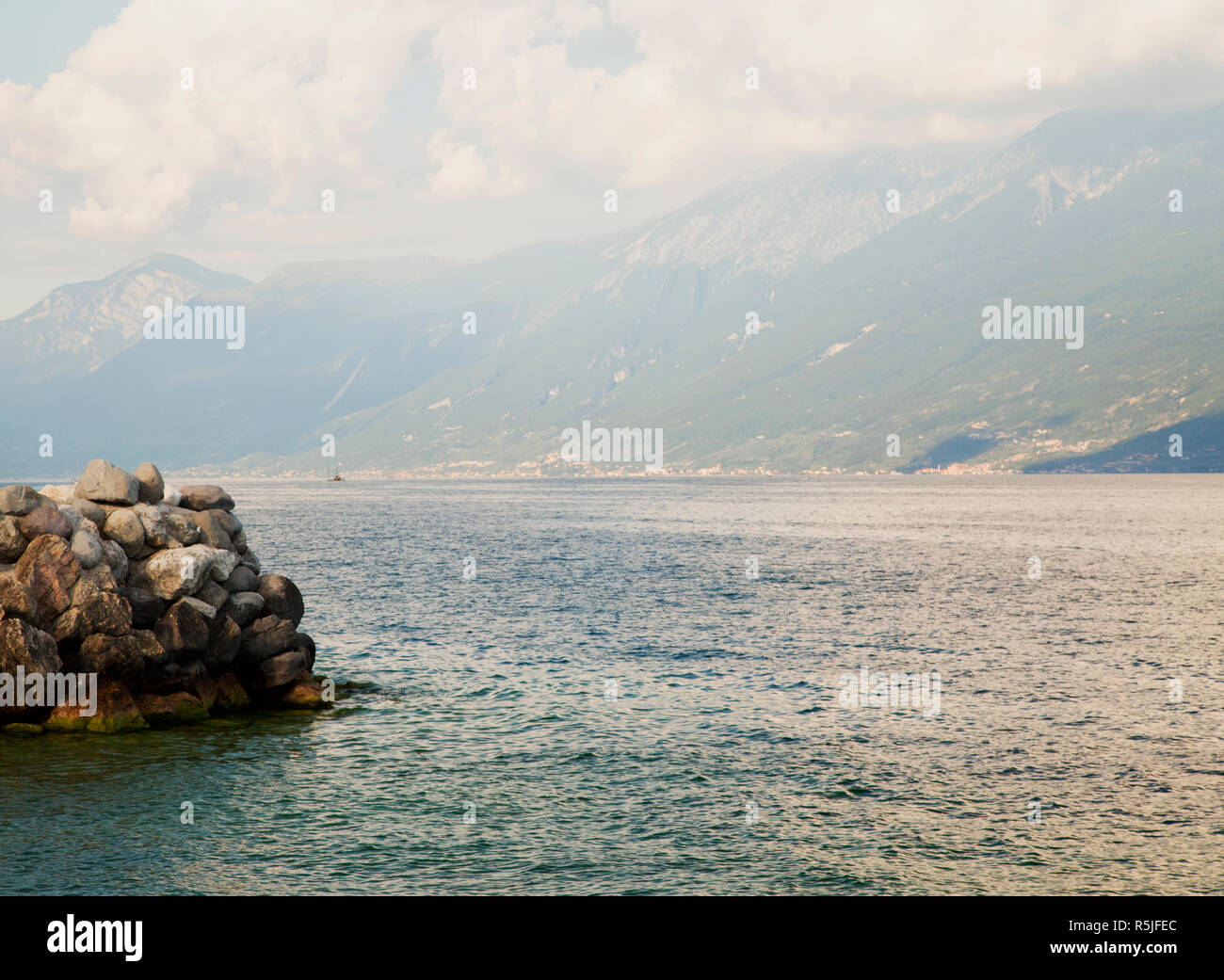 Lake view with rocks Stock Photo - Alamy