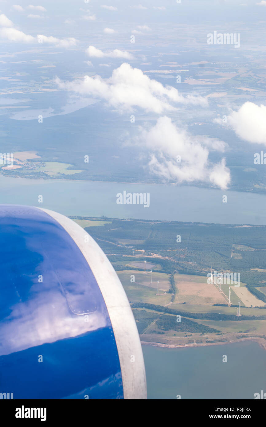 Aerial view of a wind farm with electric generators from aircraft ...