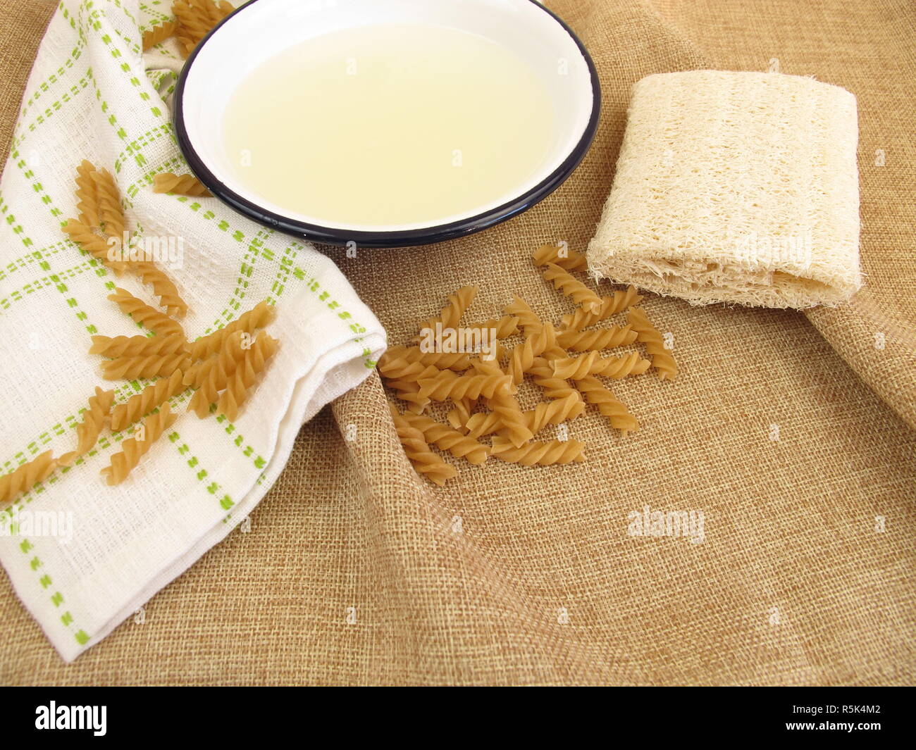foot bath with warm pasta water Stock Photo - Alamy