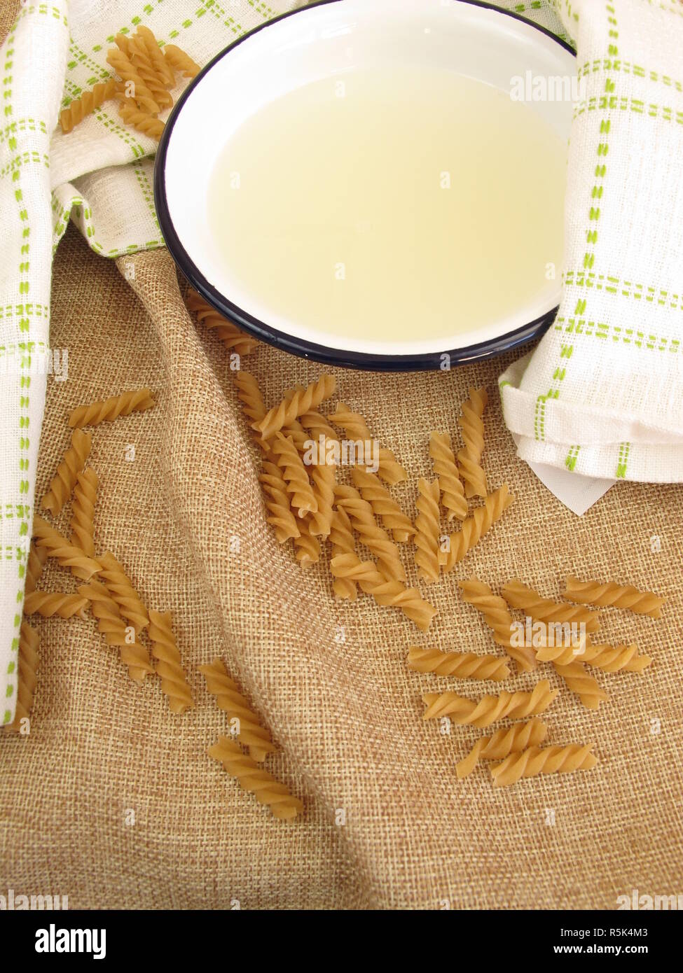 foot bath with warm pasta water Stock Photo - Alamy