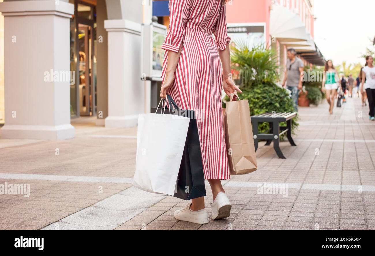 woman outlet shopping concept Stock Photo - Alamy