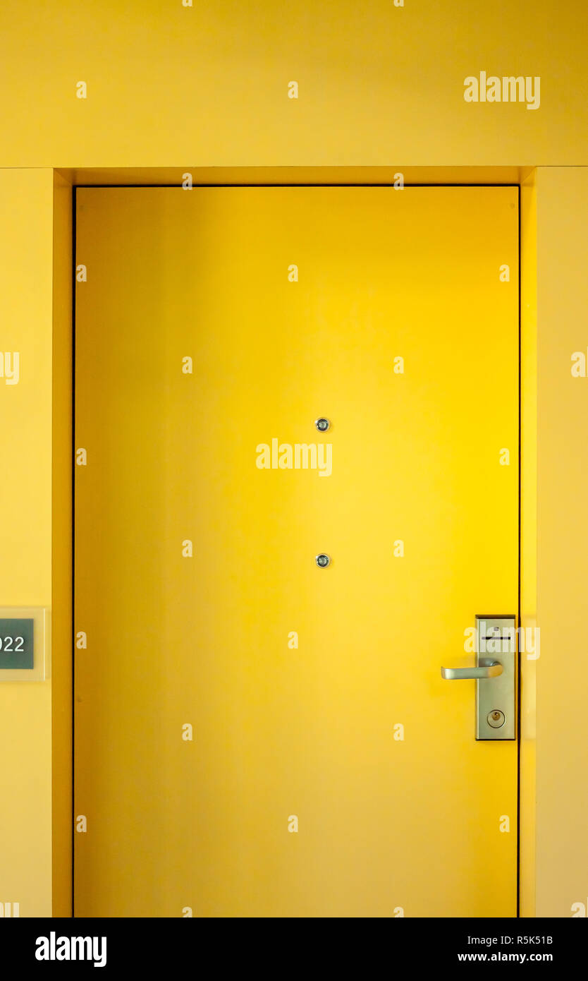 yellow hotel door Stock Photo - Alamy
