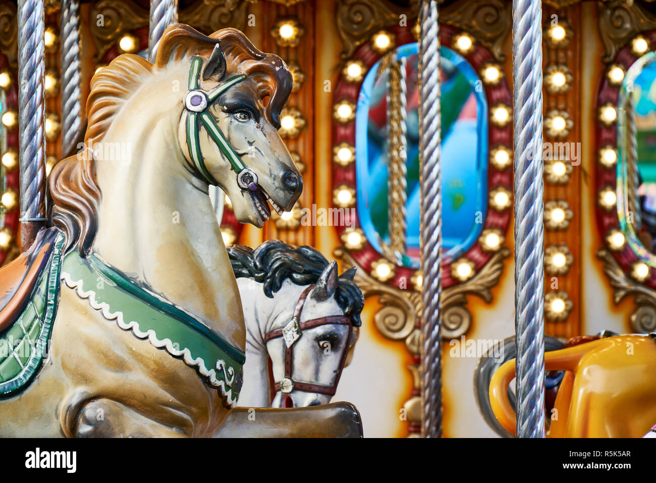 carousel details in amusement park Stock Photo - Alamy
