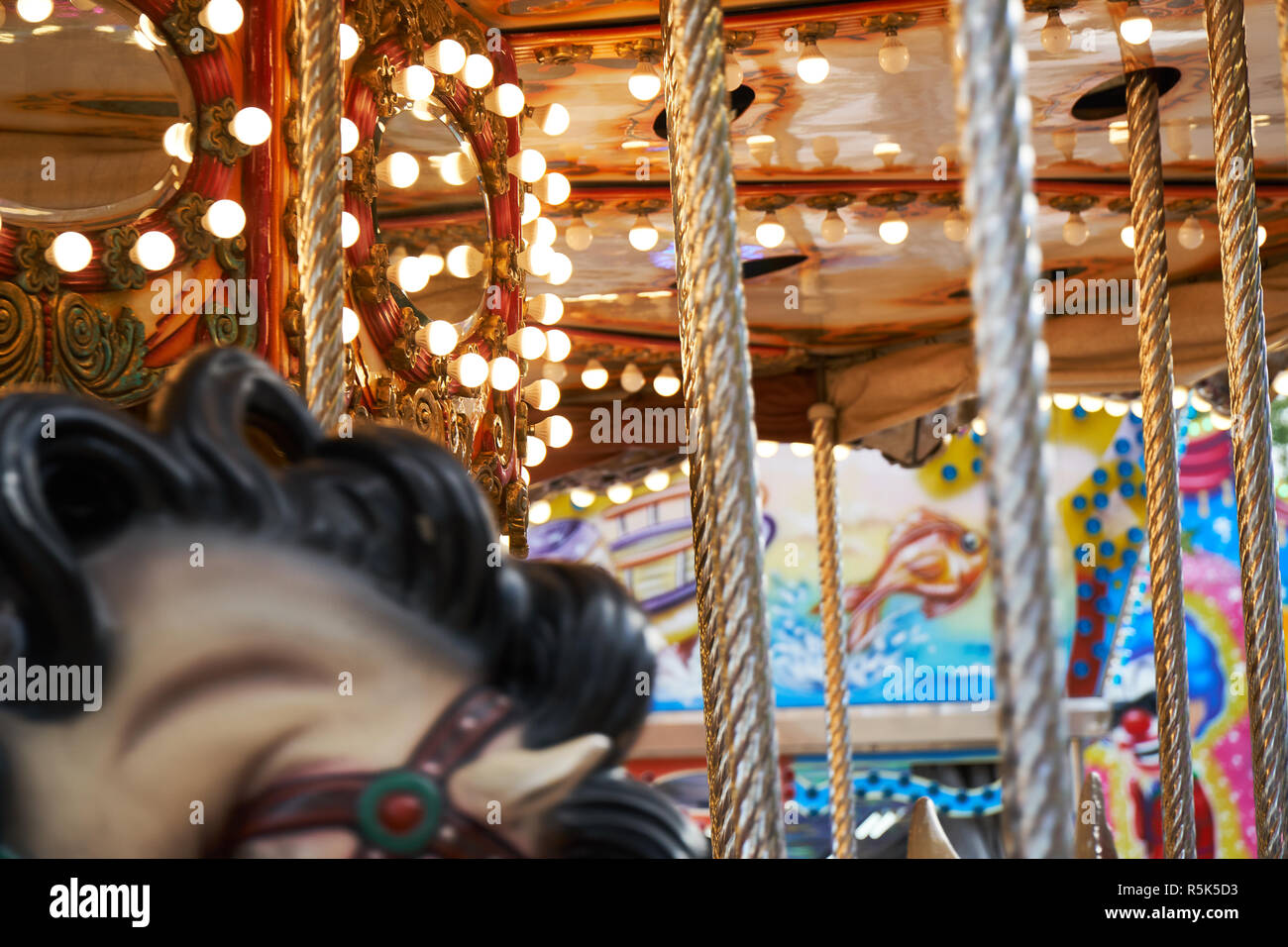 carousel details in amusement park Stock Photo - Alamy