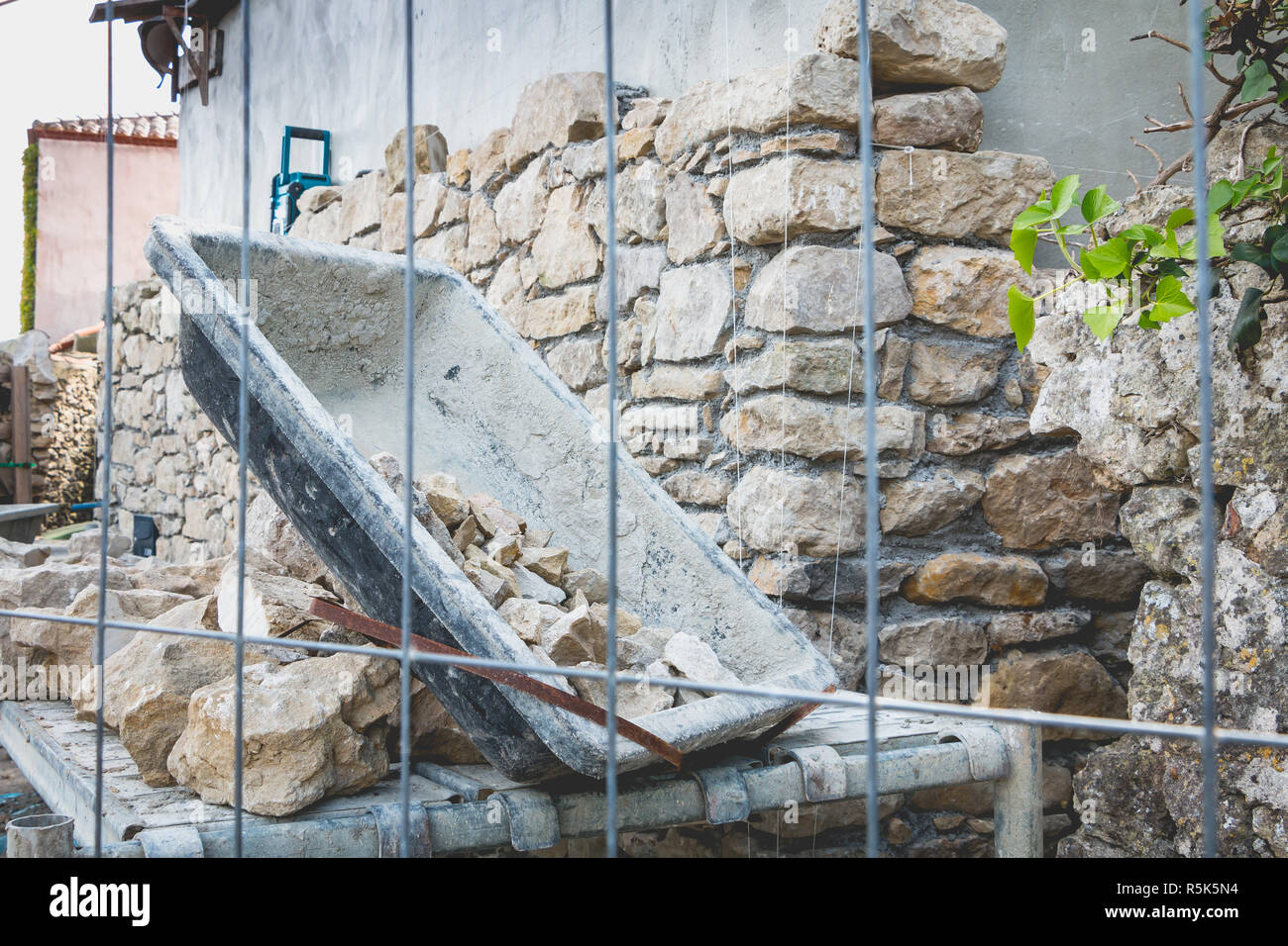 Cement mixing tray folded small stones for the construction Stock Photo ...