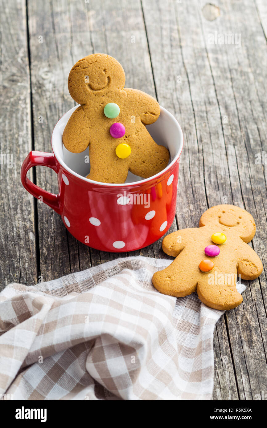 Gingerbread man in mug Stock Photo - Alamy