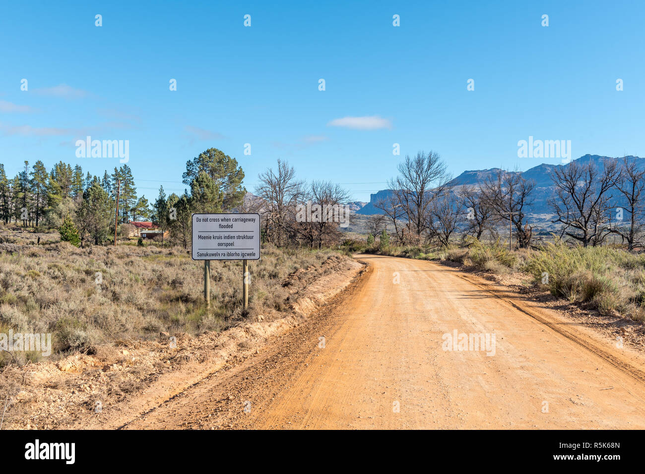 A flood warning sign at Perdekloof on the Algeria to Dwarsrivier road ...