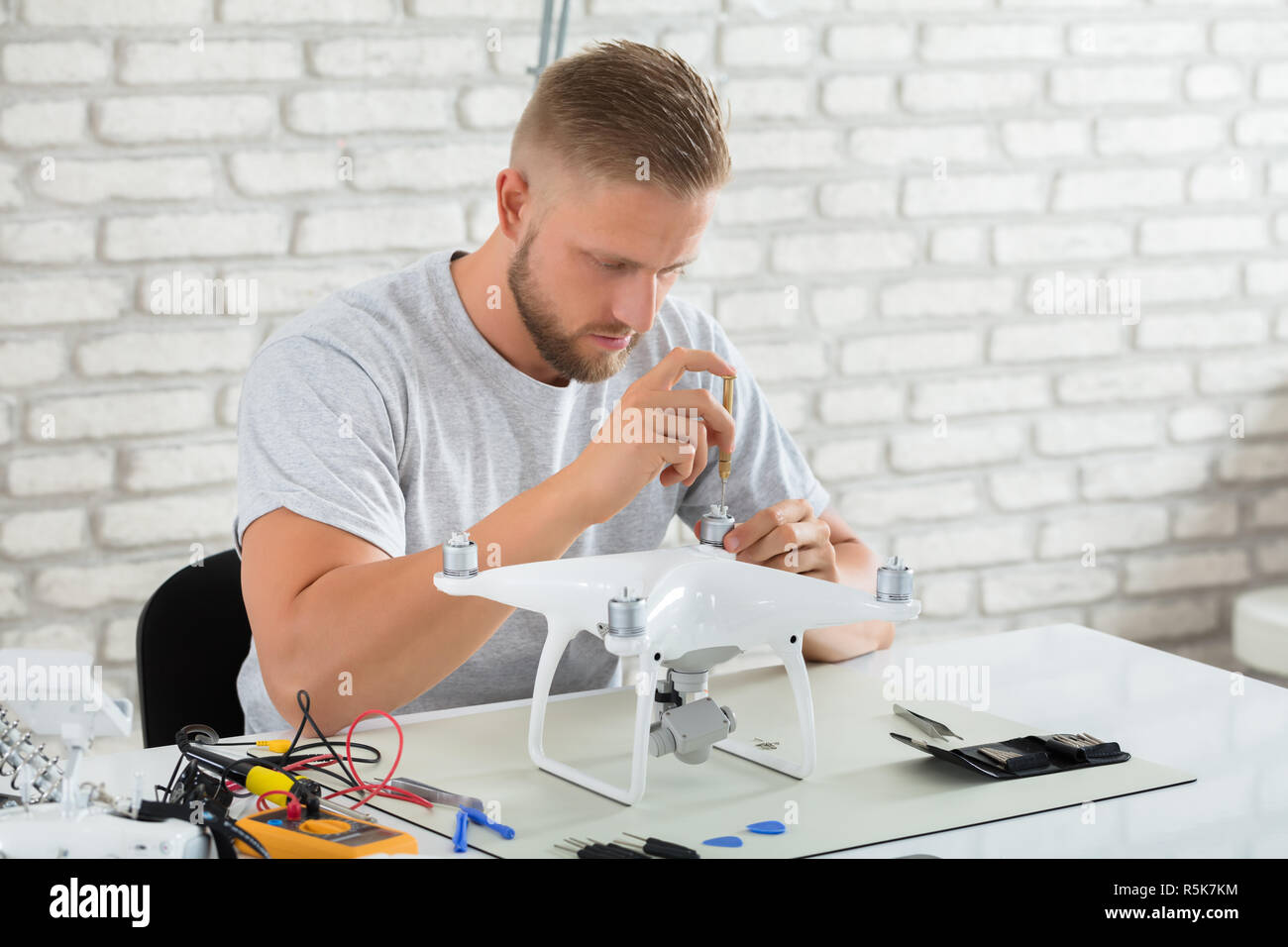 Technician Repairing Quadrocopter Drone Stock Photo - Alamy