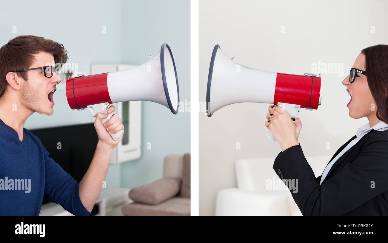 Young Man Shouting In Megaphone Stock Photo - Alamy