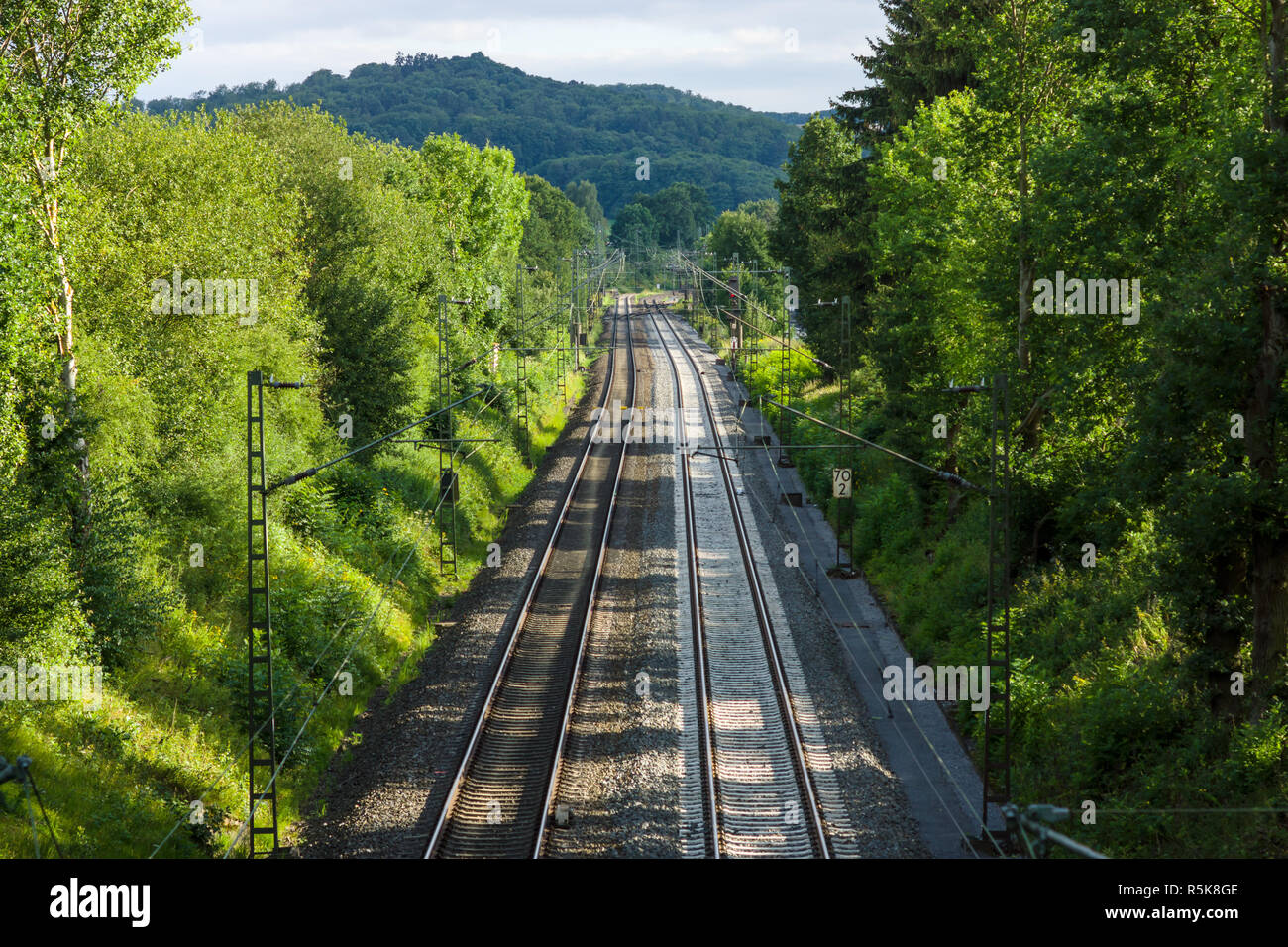 Railroad tracks that go into the distance Stock Photo - Alamy
