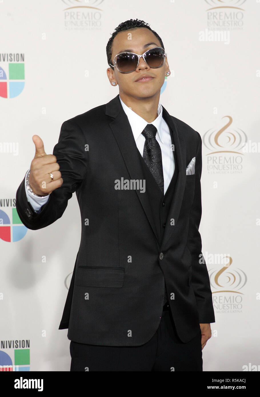 Flex arrives for the 2009 Premio Lo Nuestro award show at the ...