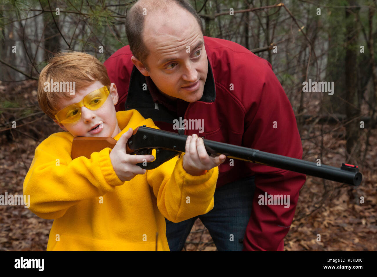 Father teaching son proper gun safety, USA Stock Photo - Alamy