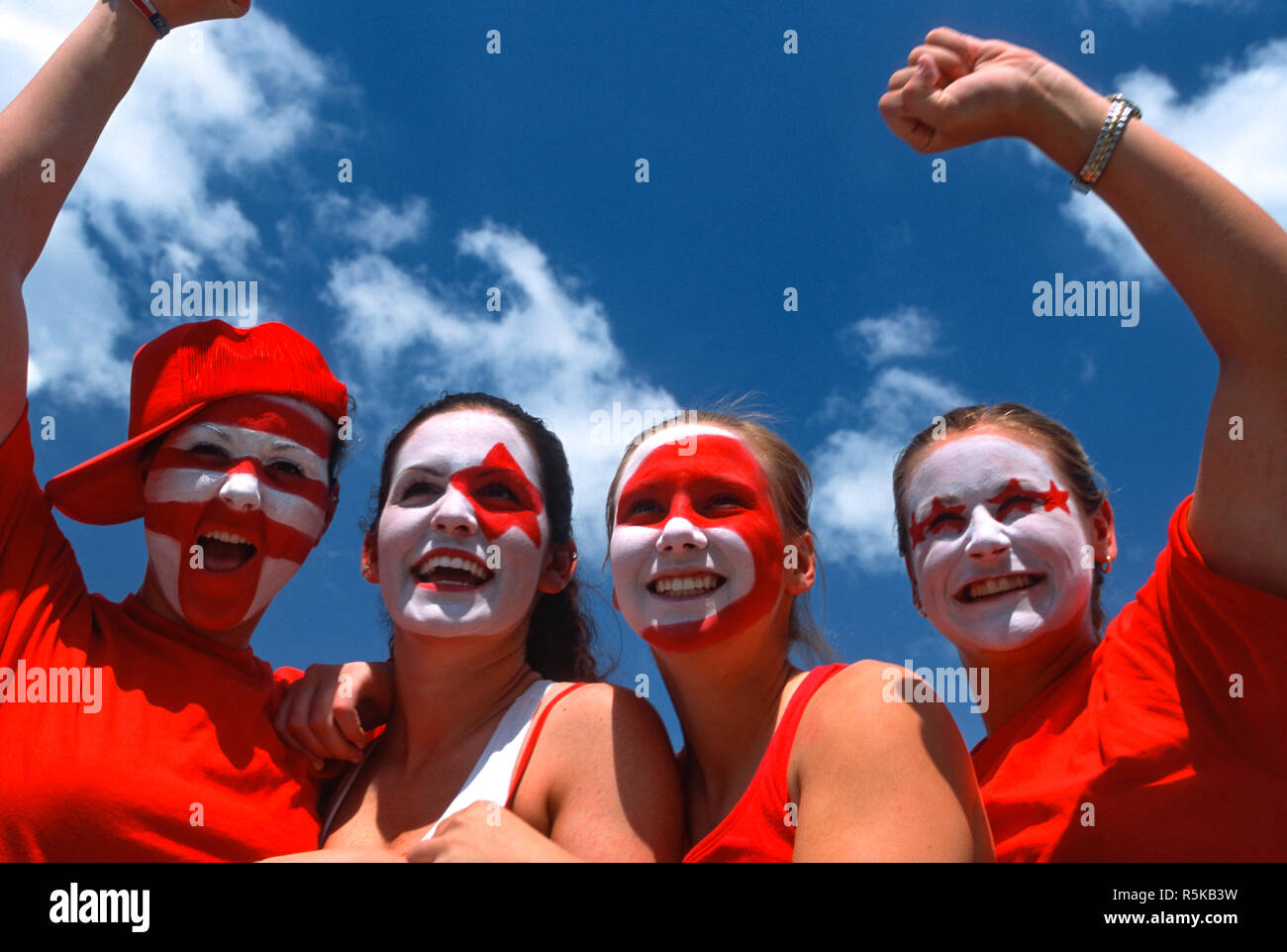 Young fans have their faces painted hi-res stock photography and images ...