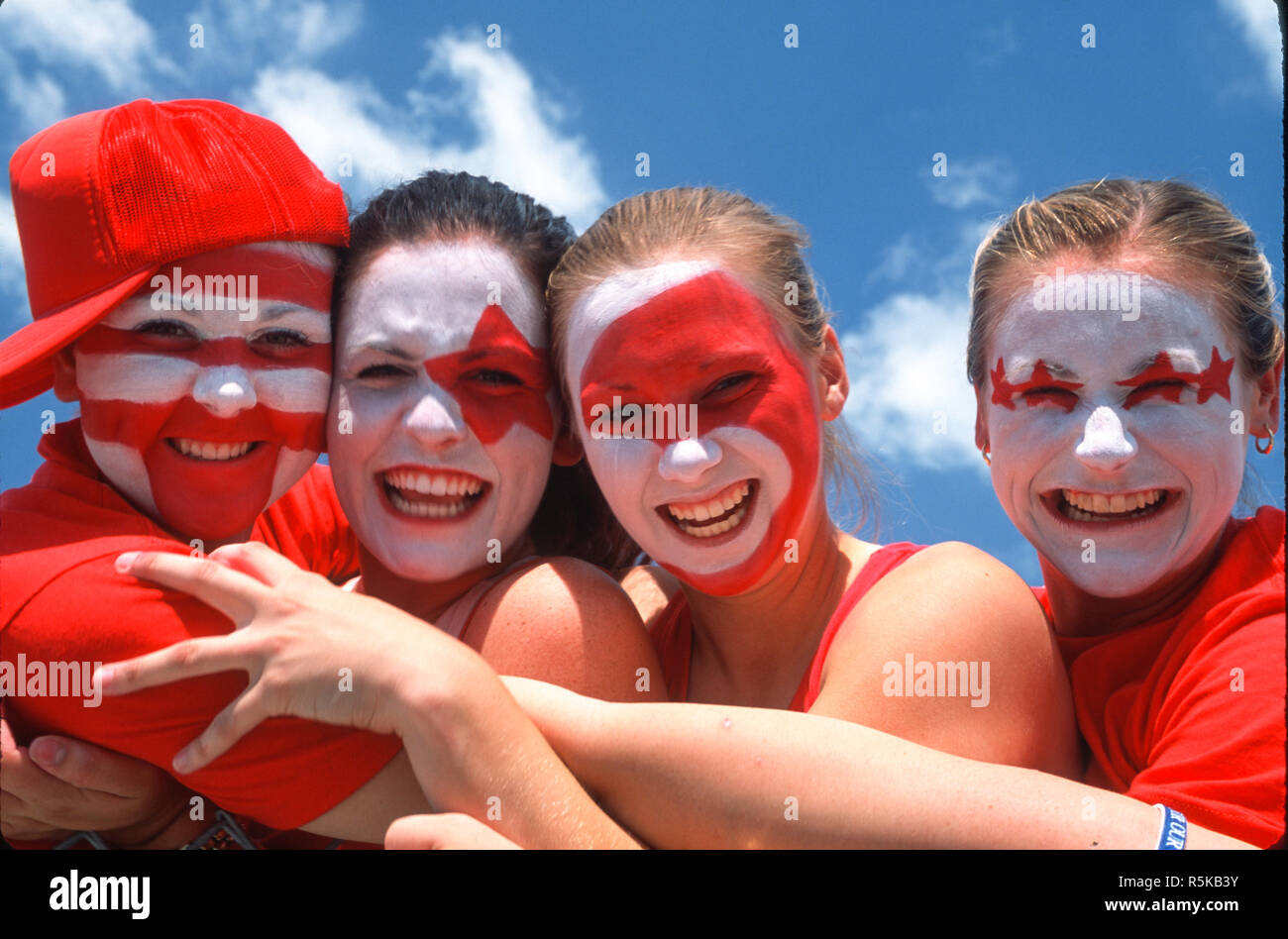 Young fans have their faces painted hi-res stock photography and images ...
