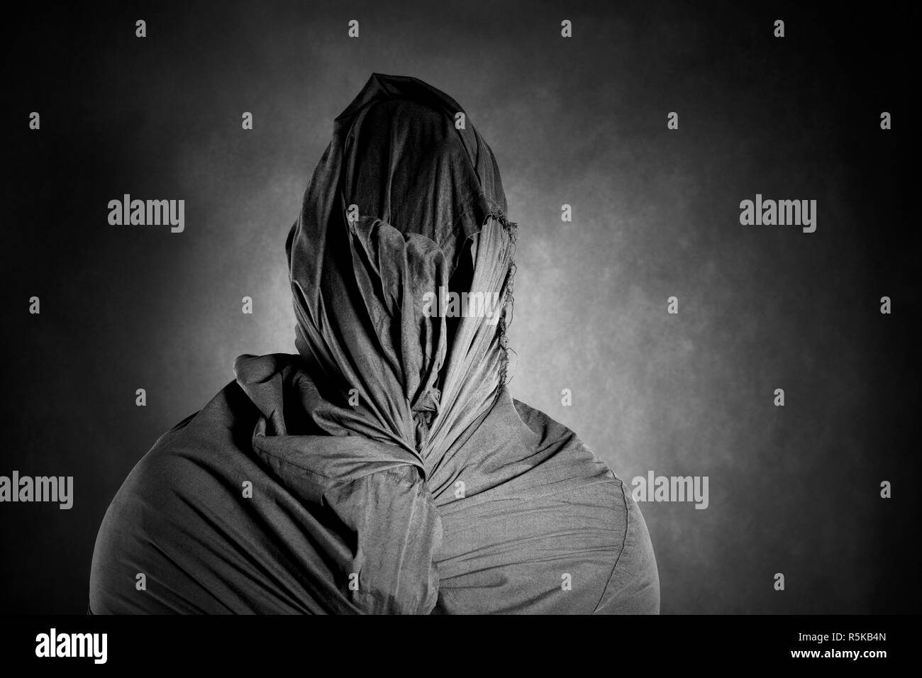 Ghostly figure in the dark Stock Photo - Alamy